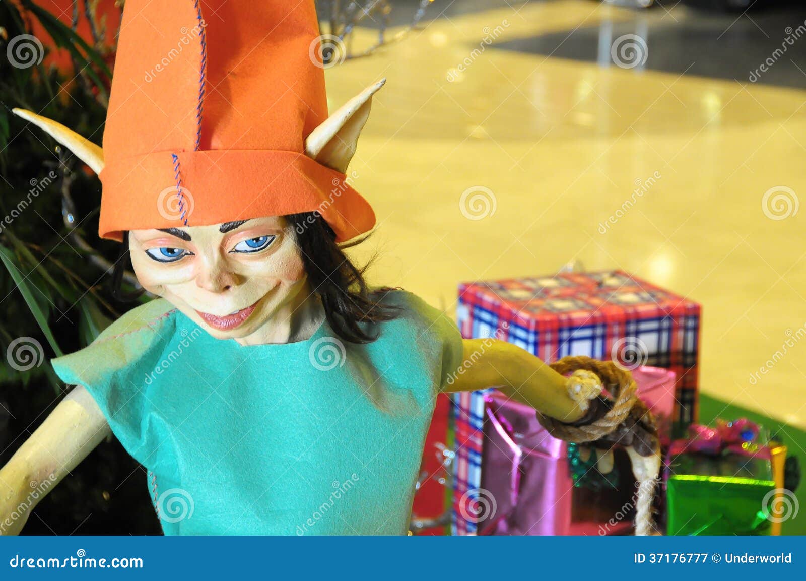 Christmas elf with gifts stock image. Image of background - 37176777
