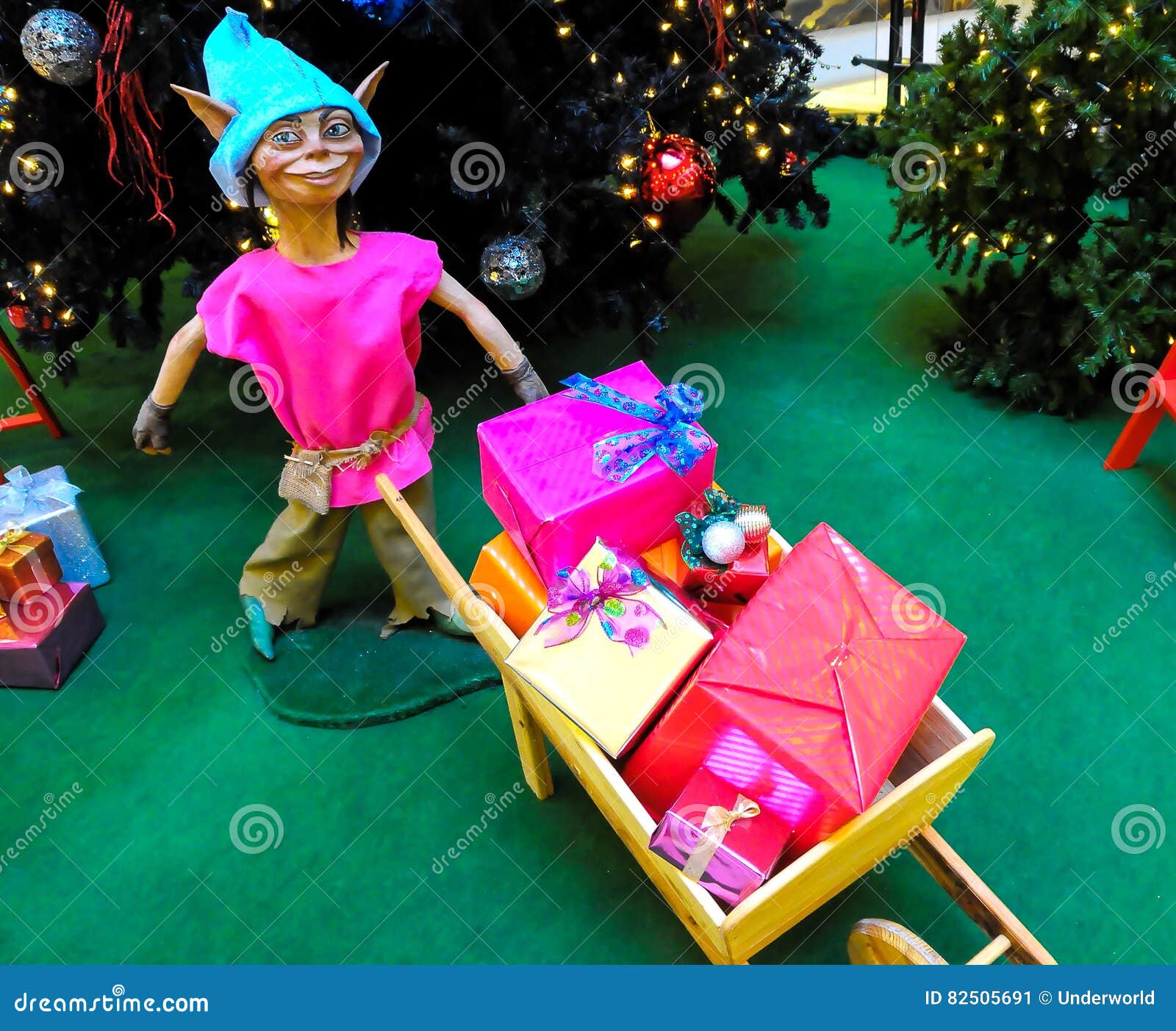 Christmas elf with gifts stock image. Image of christmas - 82505691