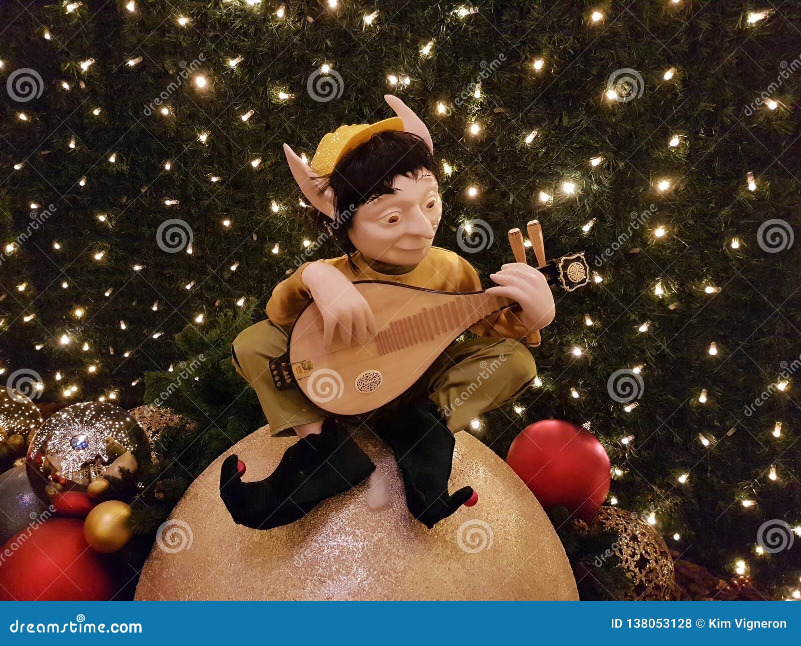 Christmas Elf on a Christmas Ball Stock Photo - Image of ball, playing ...