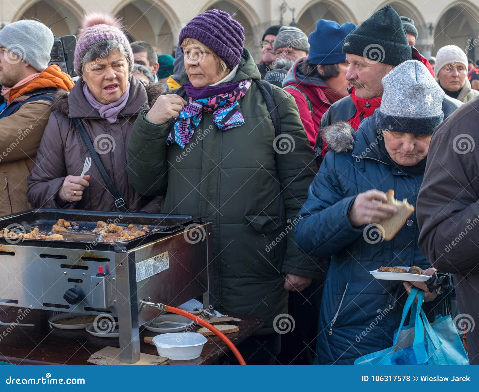 Christmas Eve for Poor and Homeless on the Main Square in Cracow ... Christmas Eve for Poor and Homeless on the Main Square in Cracow ...