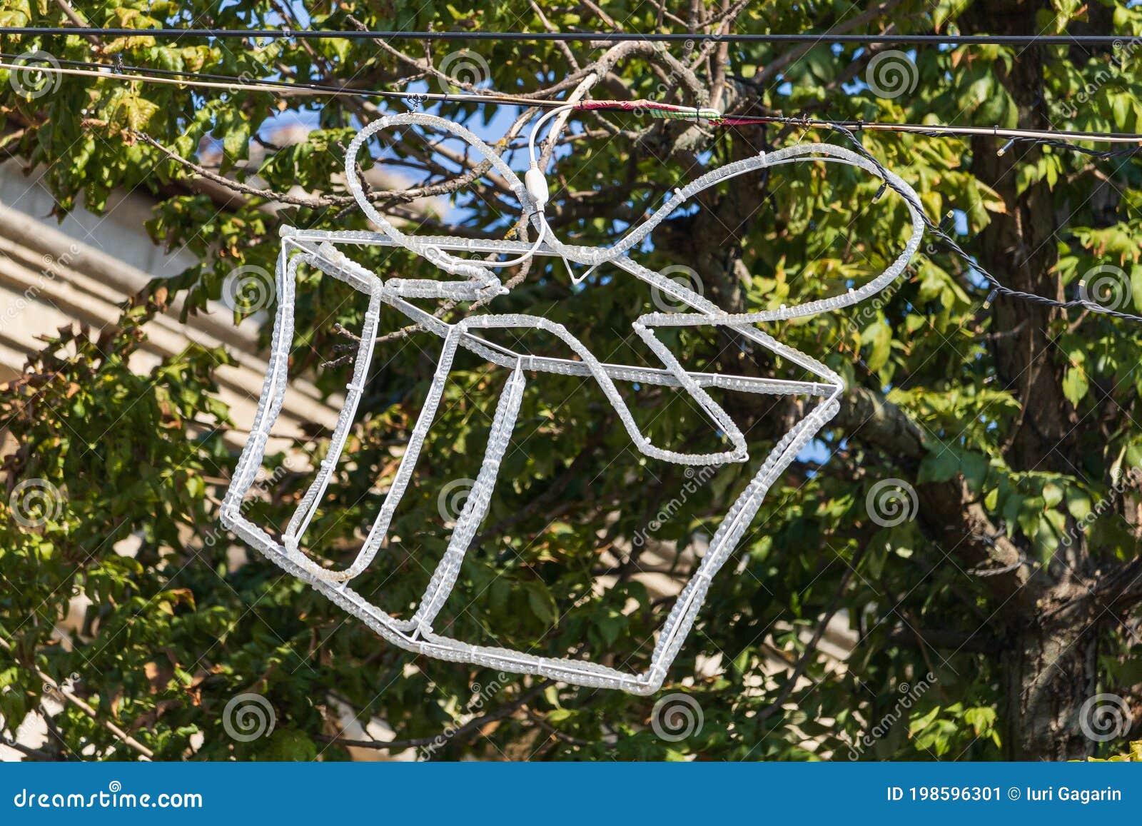 The Christmas Garland Forms an Abstract Image of a Box with a Gift ...