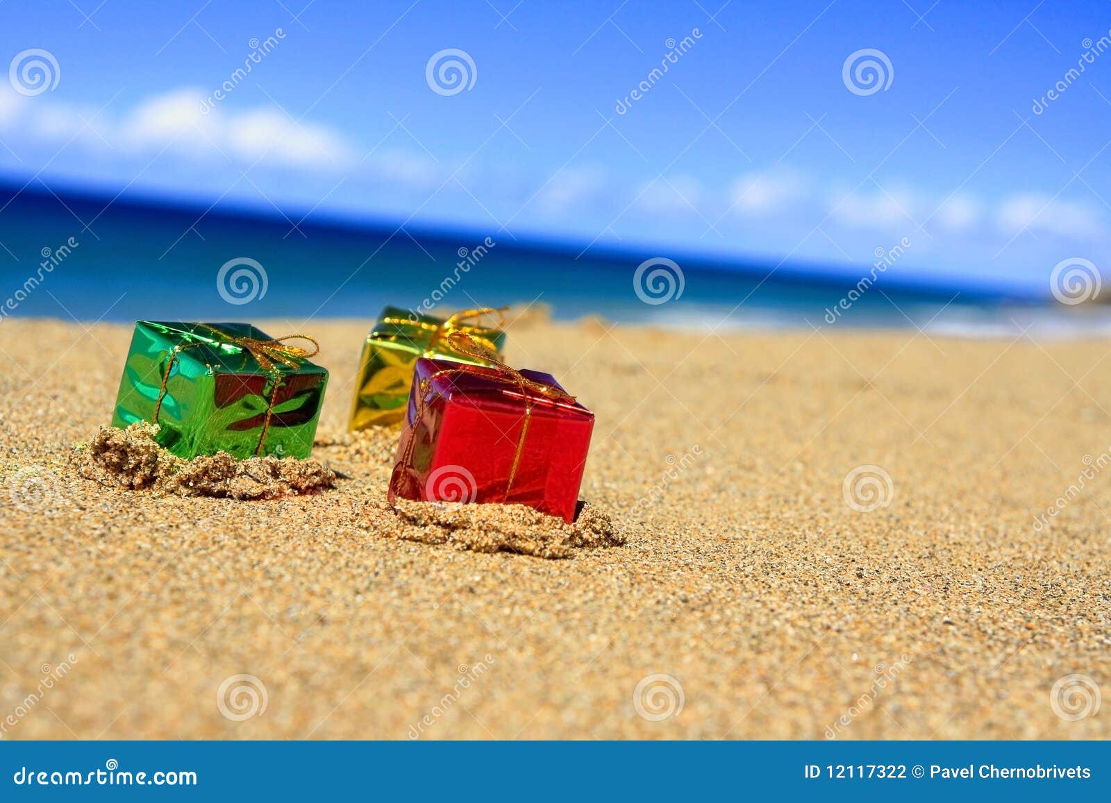 Christmas Gift Boxes on Beach Stock Photo - Image of merry, green: 12117322
