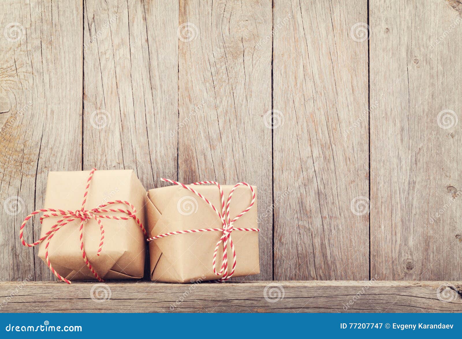 Christmas Gift Boxes in Front of Wooden Wall Stock Image - Image of ...