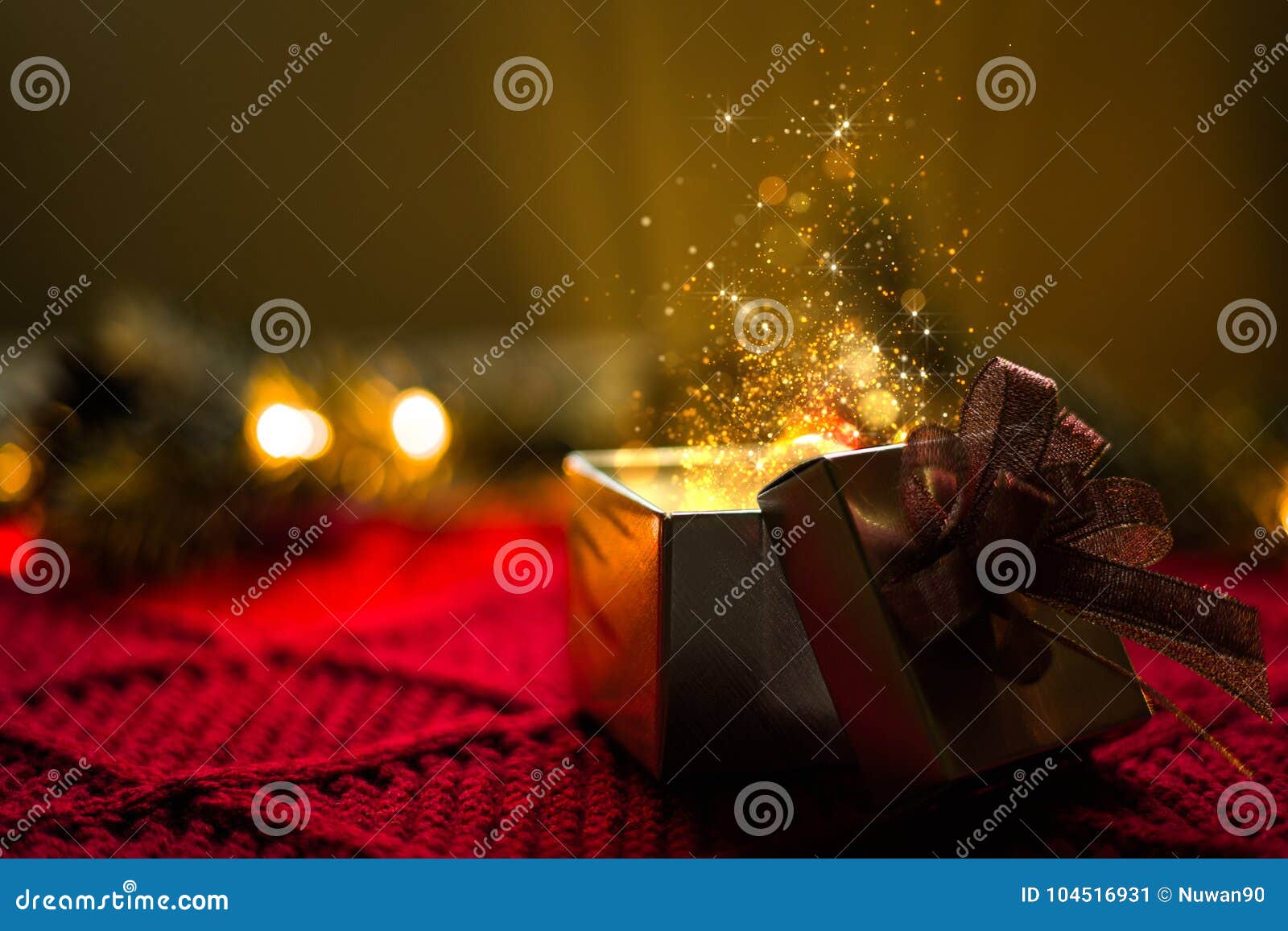 Christmas Gift with Gold Particles Magic Lights Stock Image - Image of ...