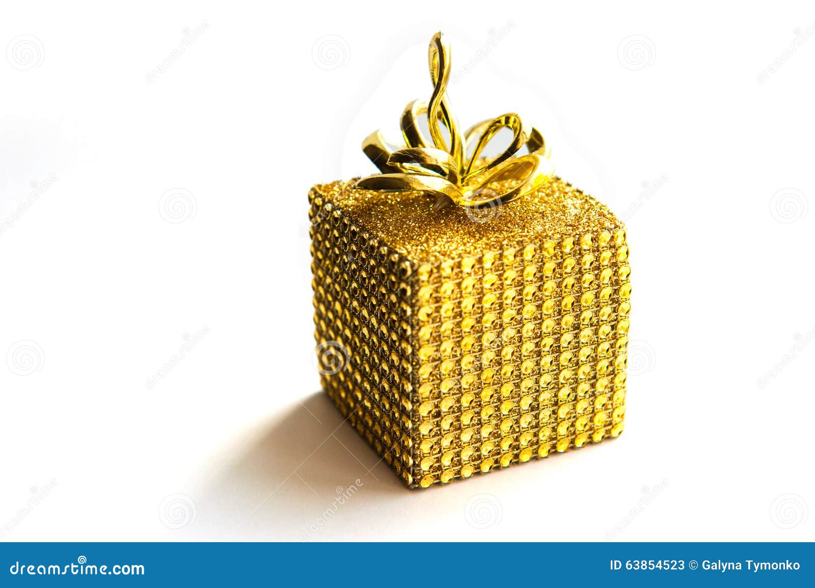 Christmas Gift Wrapped in Gold on White Bacground Stock Image - Image ...