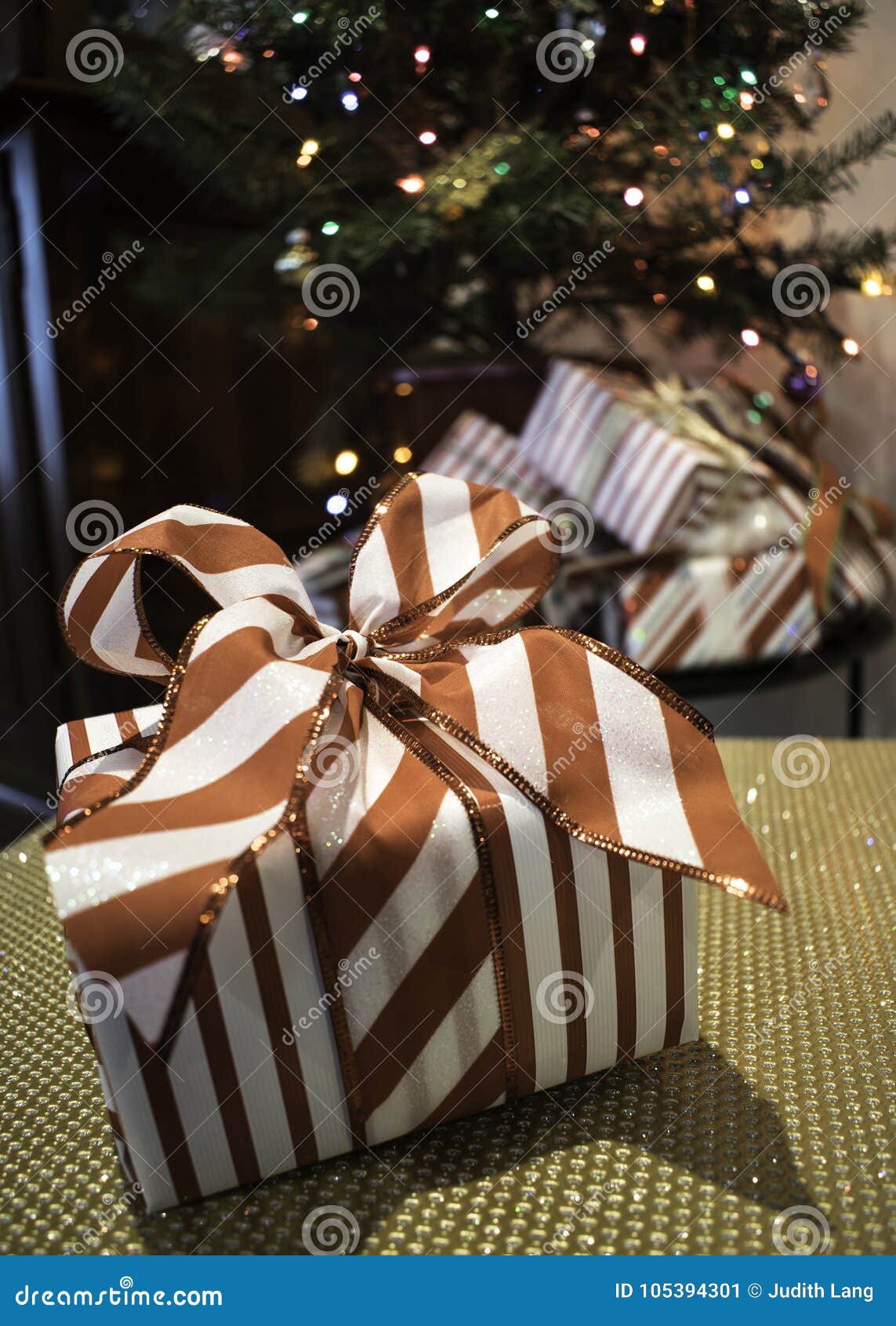 A Christmas Gift Wrapped in Red and White Stripes. Stock Image - Image ...