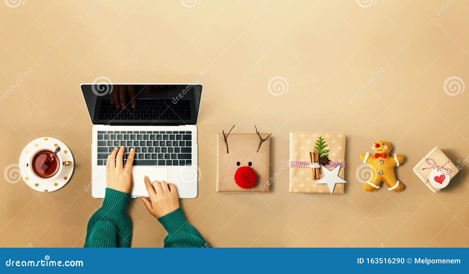 Christmas Giftboxes with Person Using a Laptop Computer Stock Photo ...