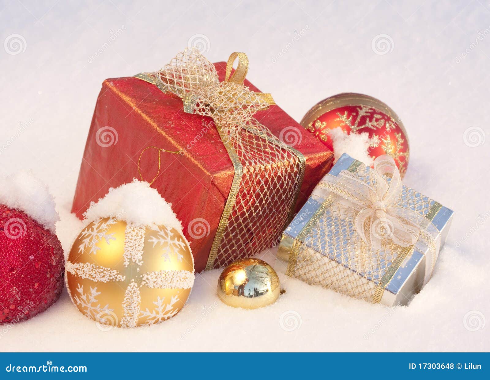 Christmas gifts on snow stock photo. Image of decoration - 17303648