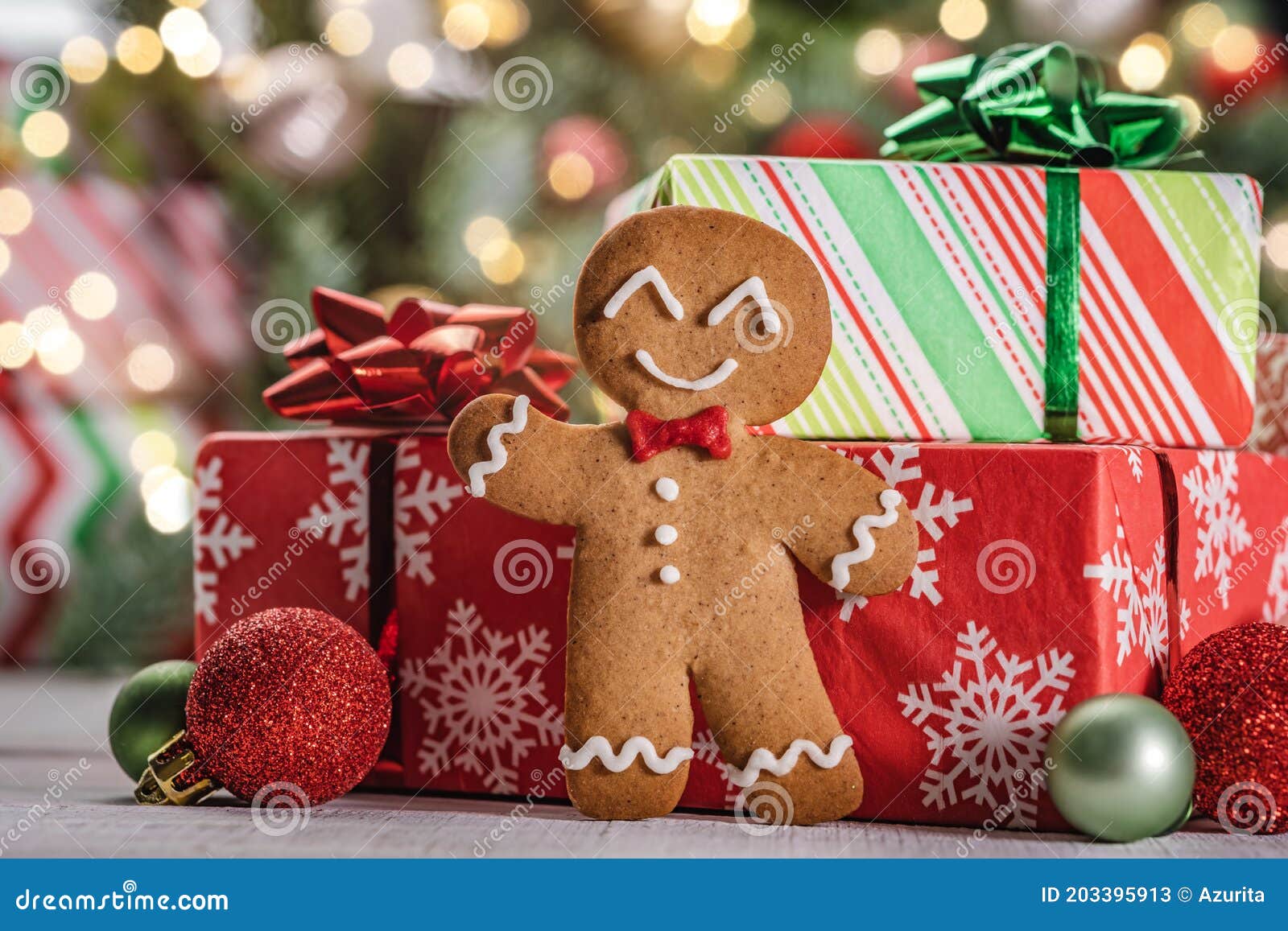 Christmas Gingerbread Man and Gift Box Stock Image - Image of light ...