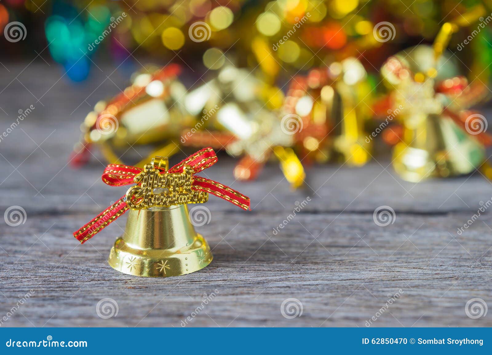 Christmas Gold Bells with Bokeh Decorations Background. Stock Photo ...