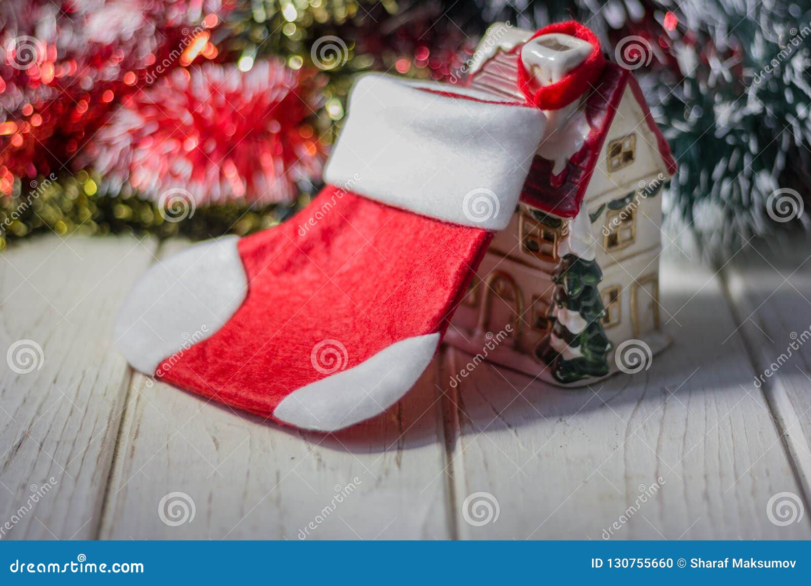 Christmas House Decorated with Big Santa Boot on Pipe. Stock Photo ...