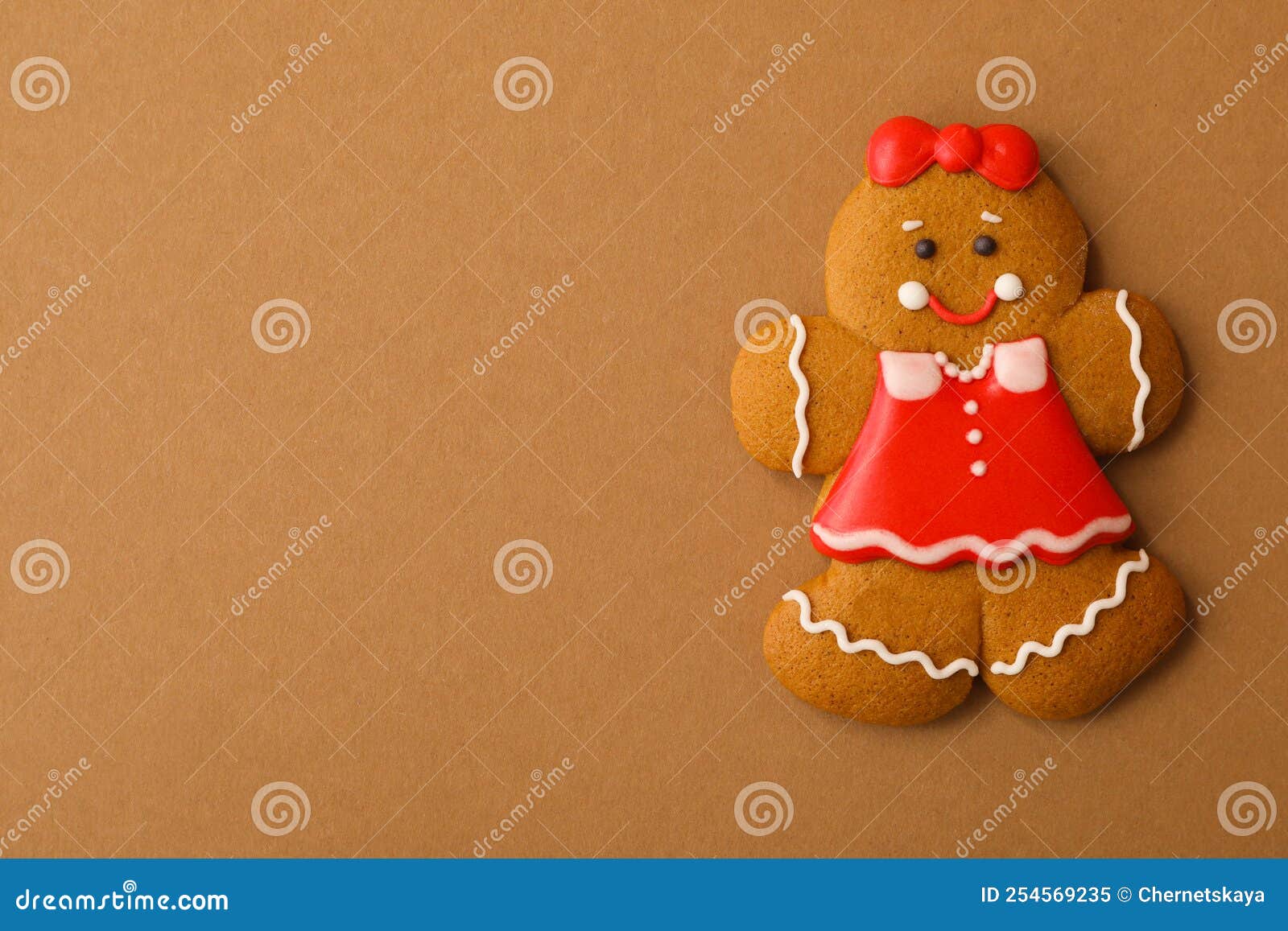 Christmas Human Shaped Gingerbread Cookie on Brown Background, Top View ...