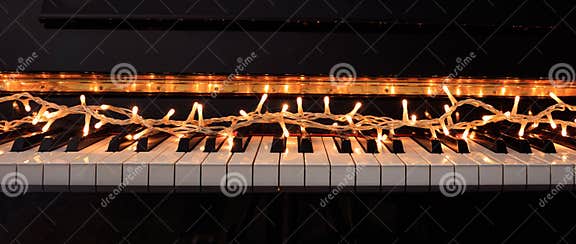 Christmas Lights on a Piano Keyboard, Front View Stock Image - Image of ...