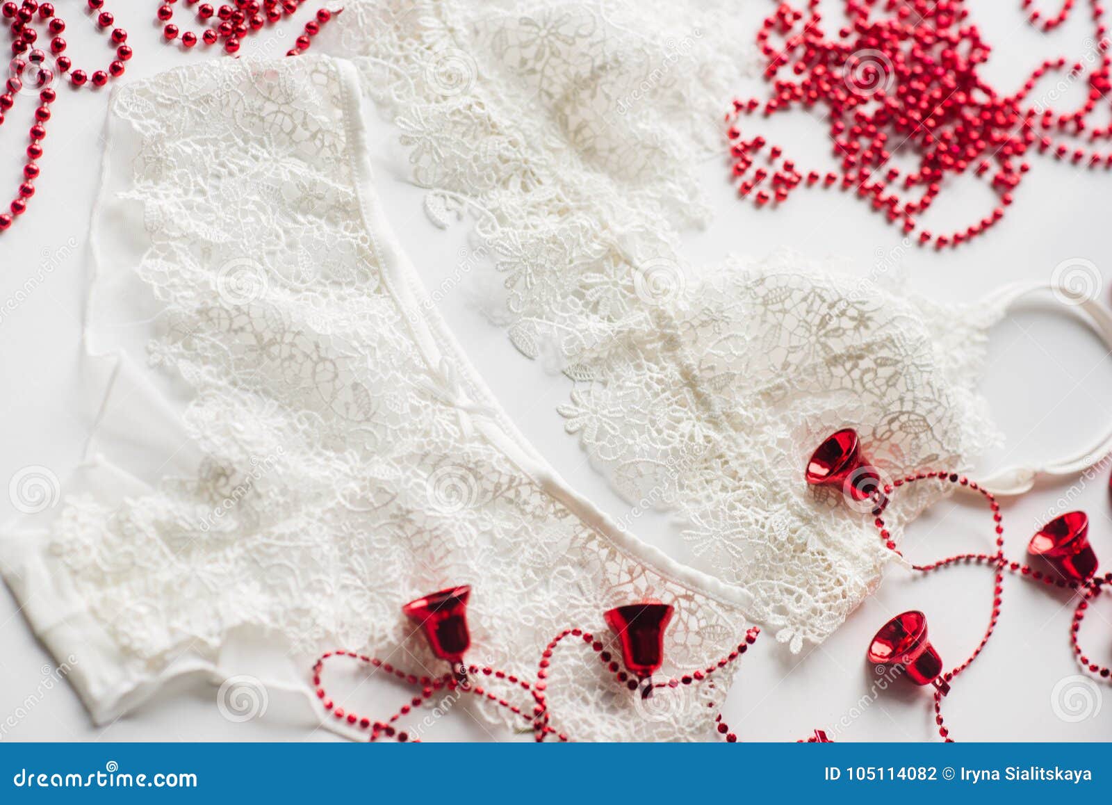 Christmas Lingerie Red Beads Branch Of A Green Christmas Tree On A