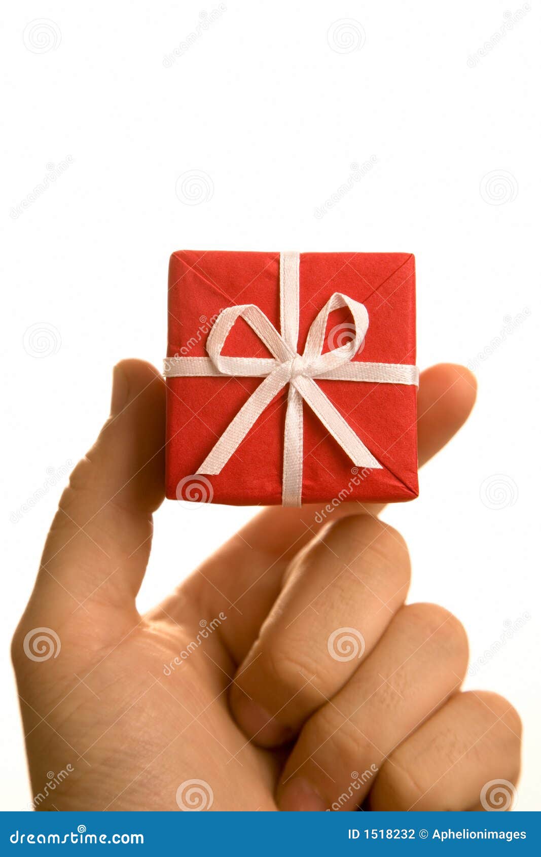 Christmas present in hand stock photo. Image of party - 1518232