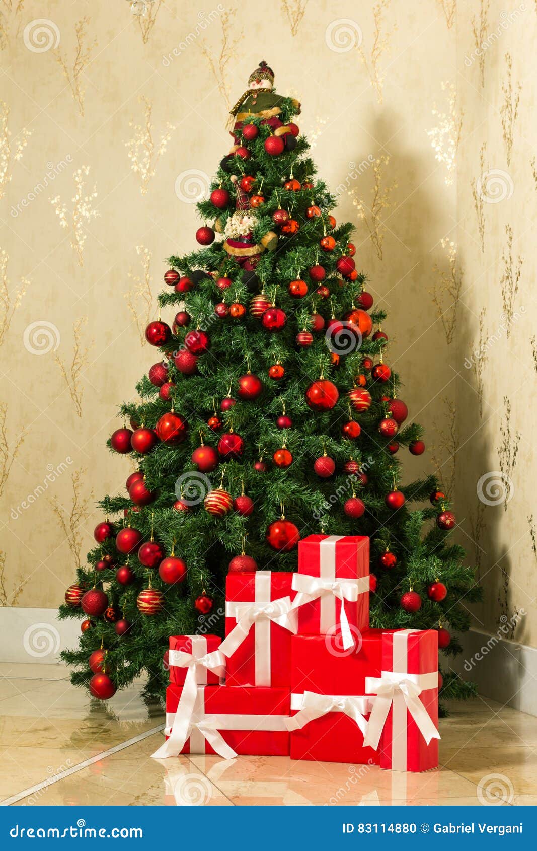 Christmas present at tree stock photo. Image of garnish - 83114880