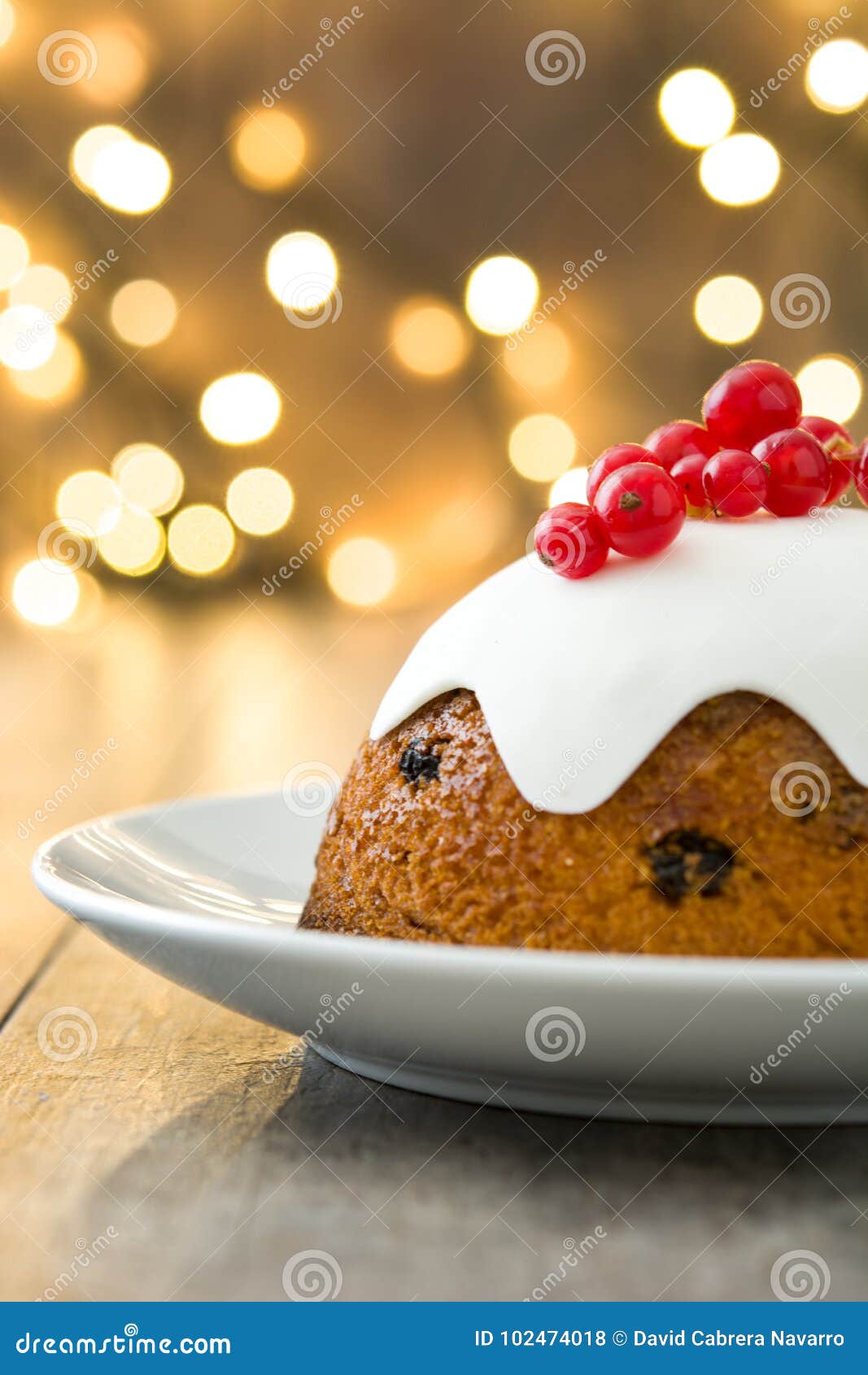 Christmas Pudding and Christmas Light on Wood Stock Photo - Image of ...