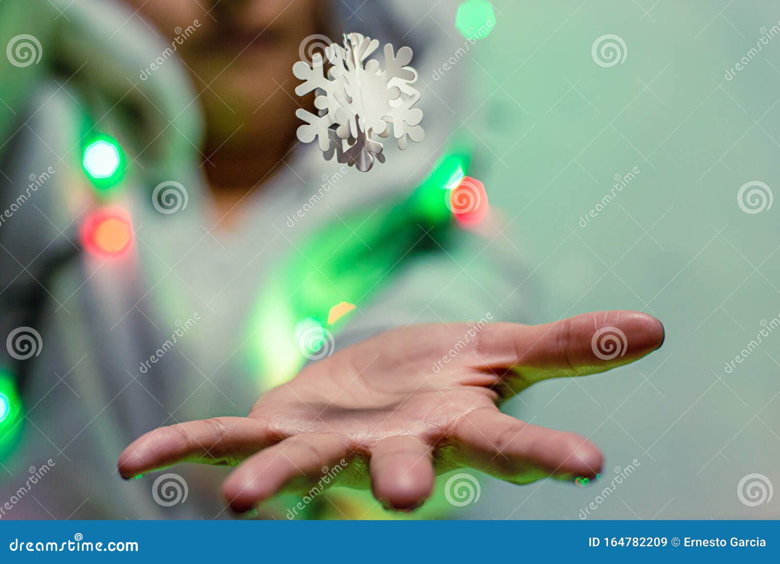 Christmas Snowflake Falling on a Person Hand Stock Image - Image of ...
