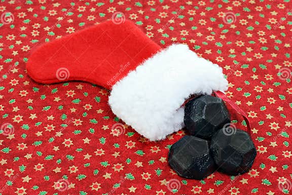 Christmas Stocking with Coal Stock Photo - Image of tablecloth, objects ...