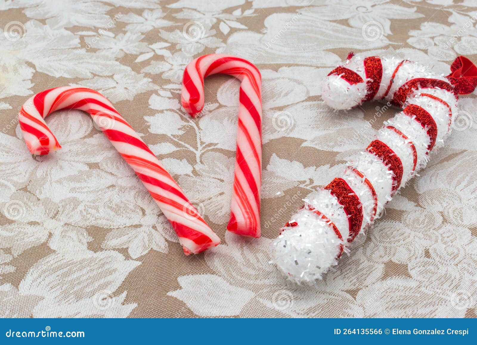 Christmas Sweets Assortment, Three Candy Canes in Red and White. One is ...