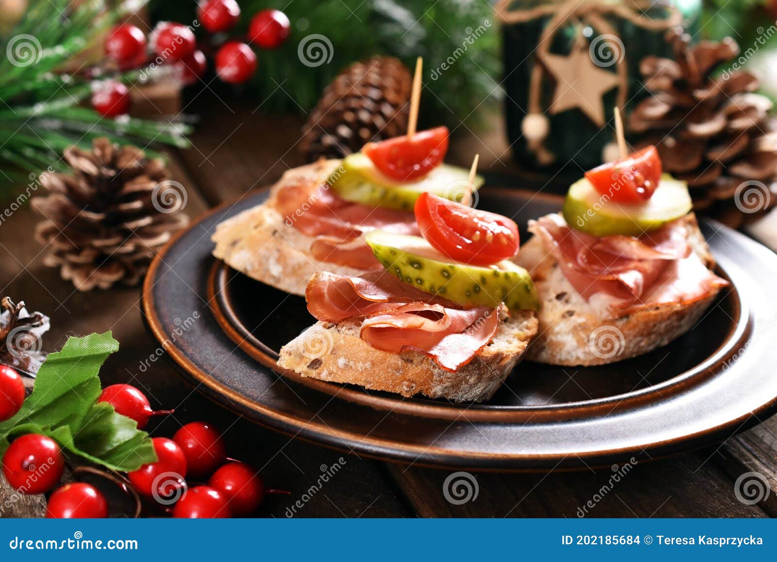 Christmas Table with Mini Canapes with Parma Ham and Pickled Cucumber ...