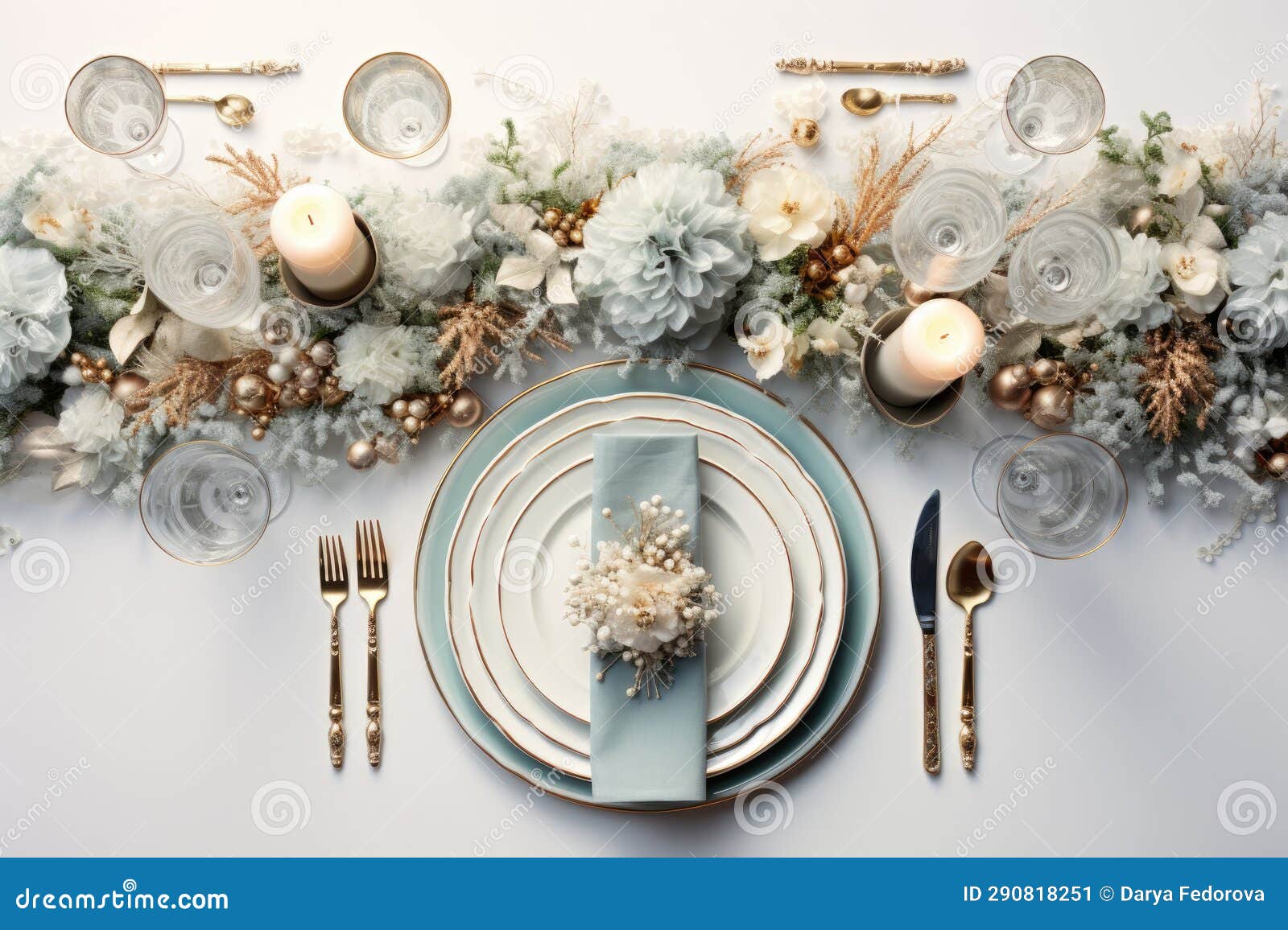 Christmas Table Setting with Dishware, Silverware and Decorations on ...