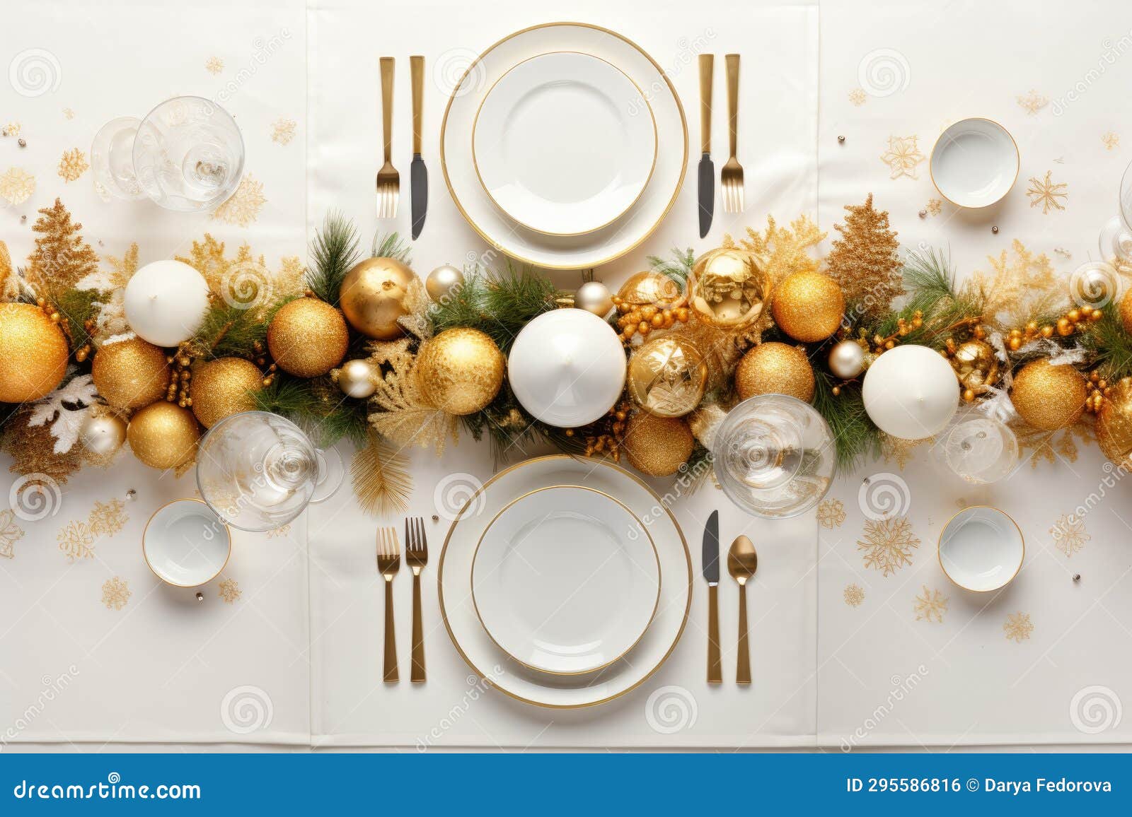 Christmas Table Setting with Dishware, Silverware and Decorations on ...