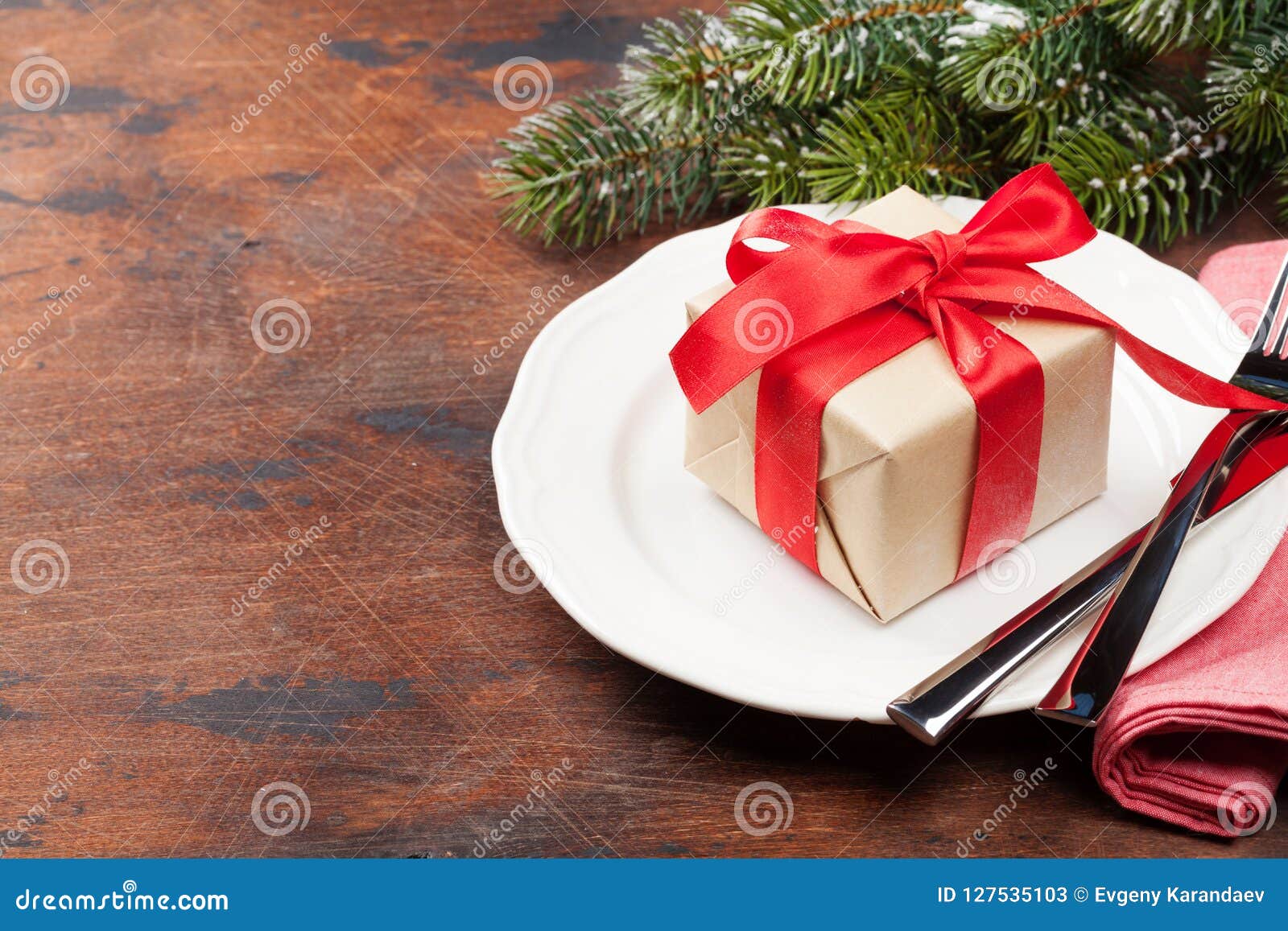 Christmas Table Setting with Gift Box and Xmas Tree Stock Image - Image ...