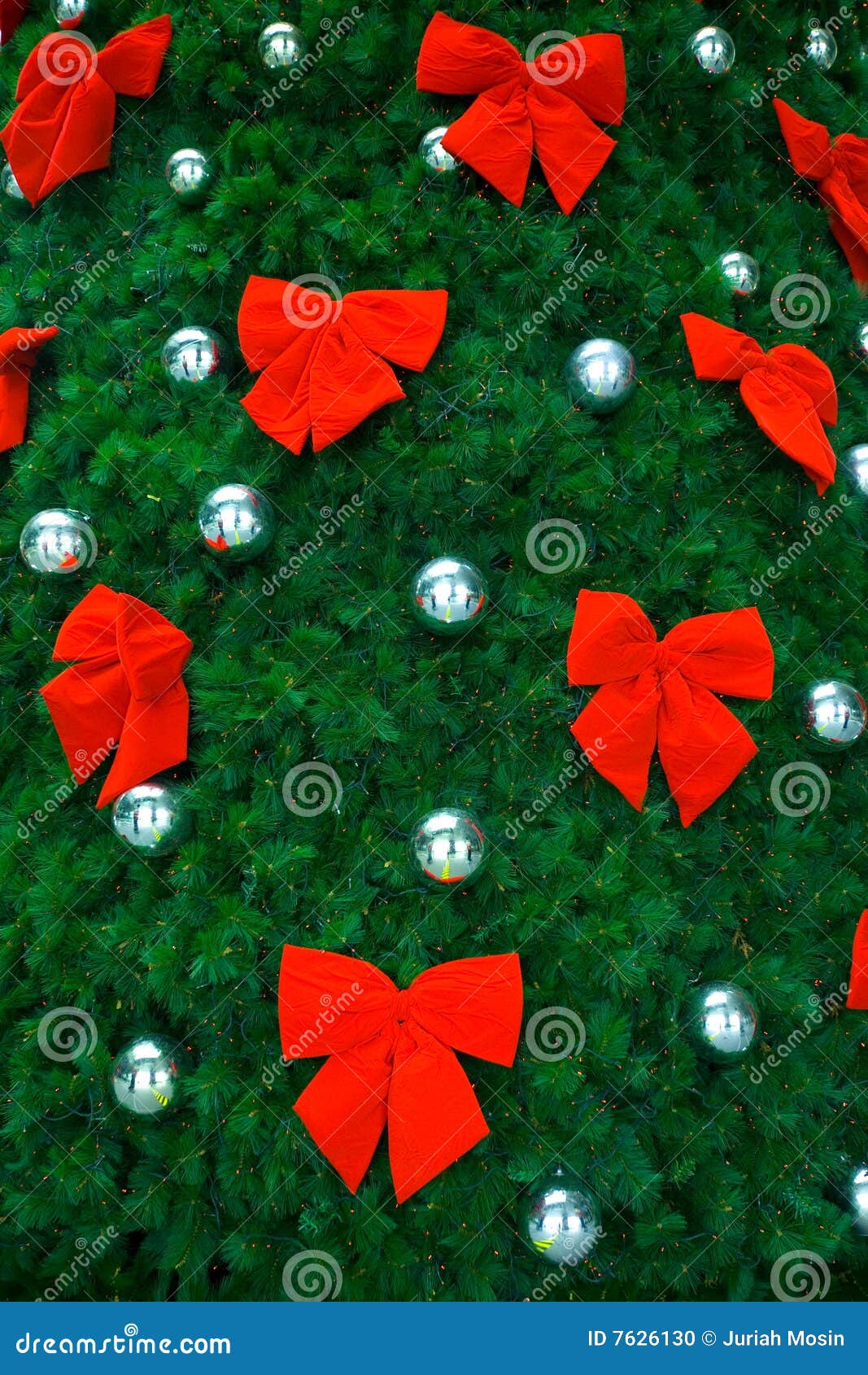 Christmas Tree Adorned with Red Bows Stock Photo - Image of fake ...