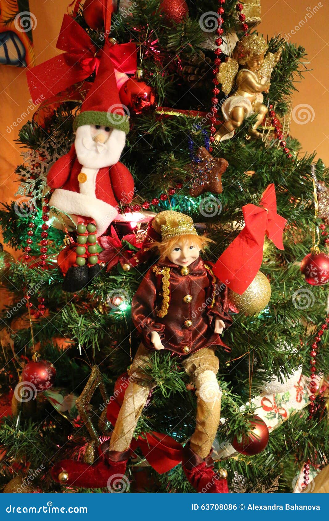 Christmas Tree Angel, Elf, Santa, Lights and Tree Decorations Stock ...