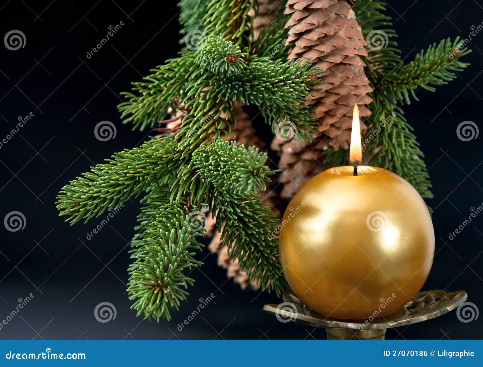 Christmas Tree Branch with Golden Burning Candle Stock Photo - Image of ...