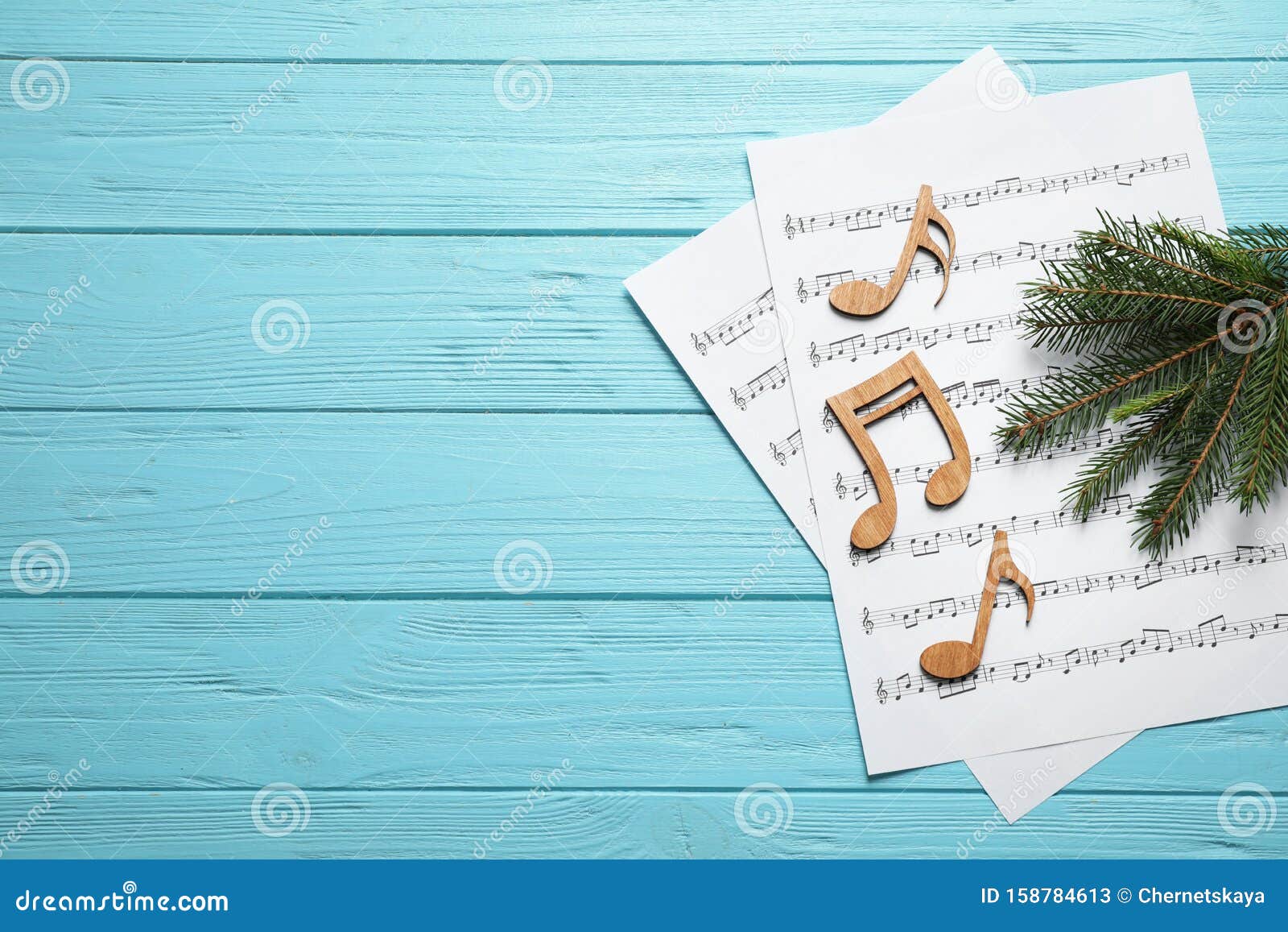 Christmas Tree Branch, Notes and Music Sheets on Wooden Table, Flat Lay ...