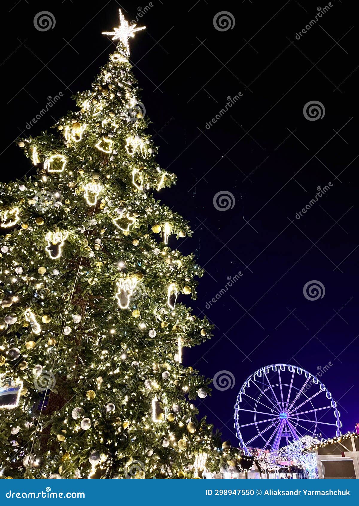Christmas Tree with Ferris Wheel in the Background at a Christmas ...