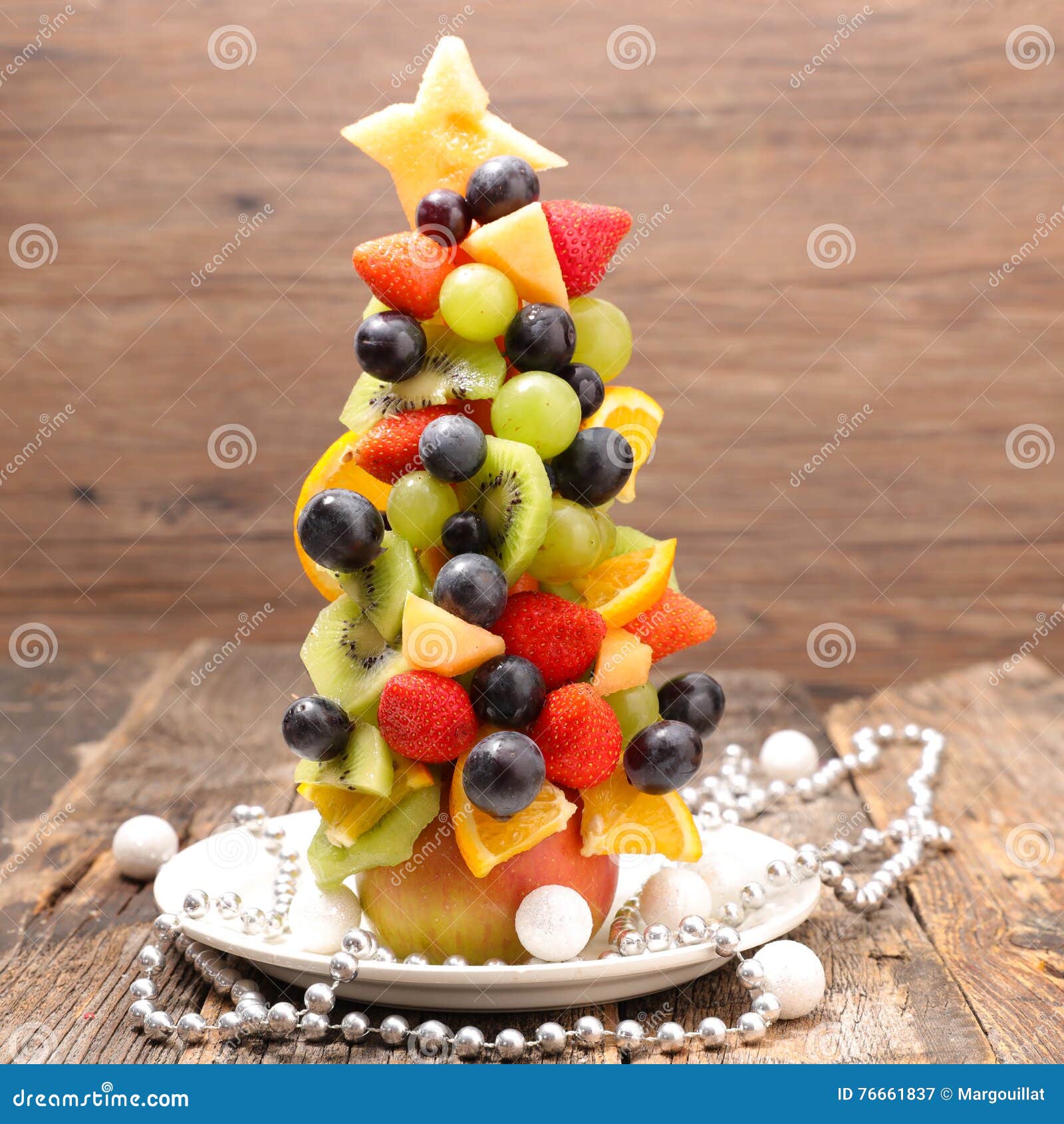 Christmas tree with fruits stock image. Image of decoration - 76661837