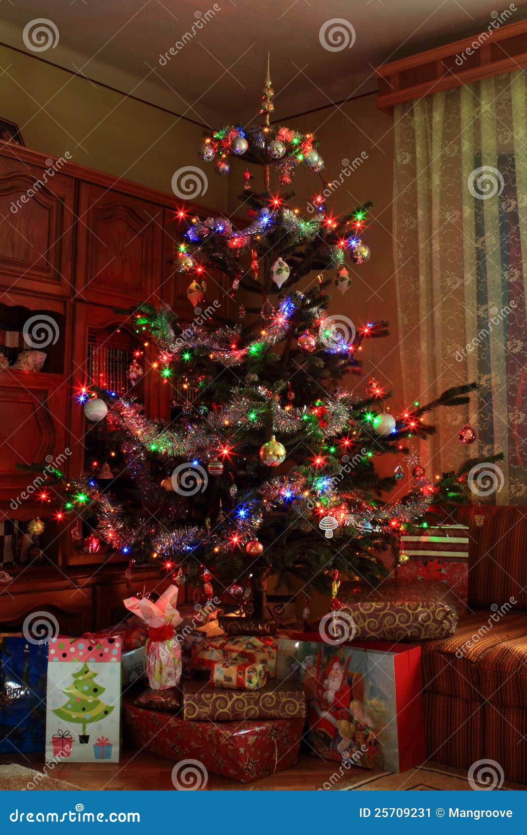 Christmas tree and gifts stock image. Image of interior - 25709231