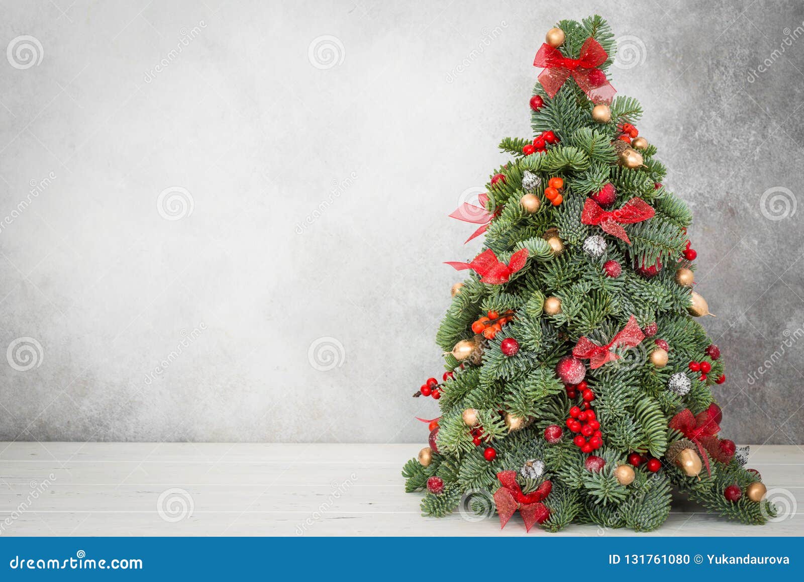 Christmas Tree on a Grey Background with Copy Space. Image for Cards ...
