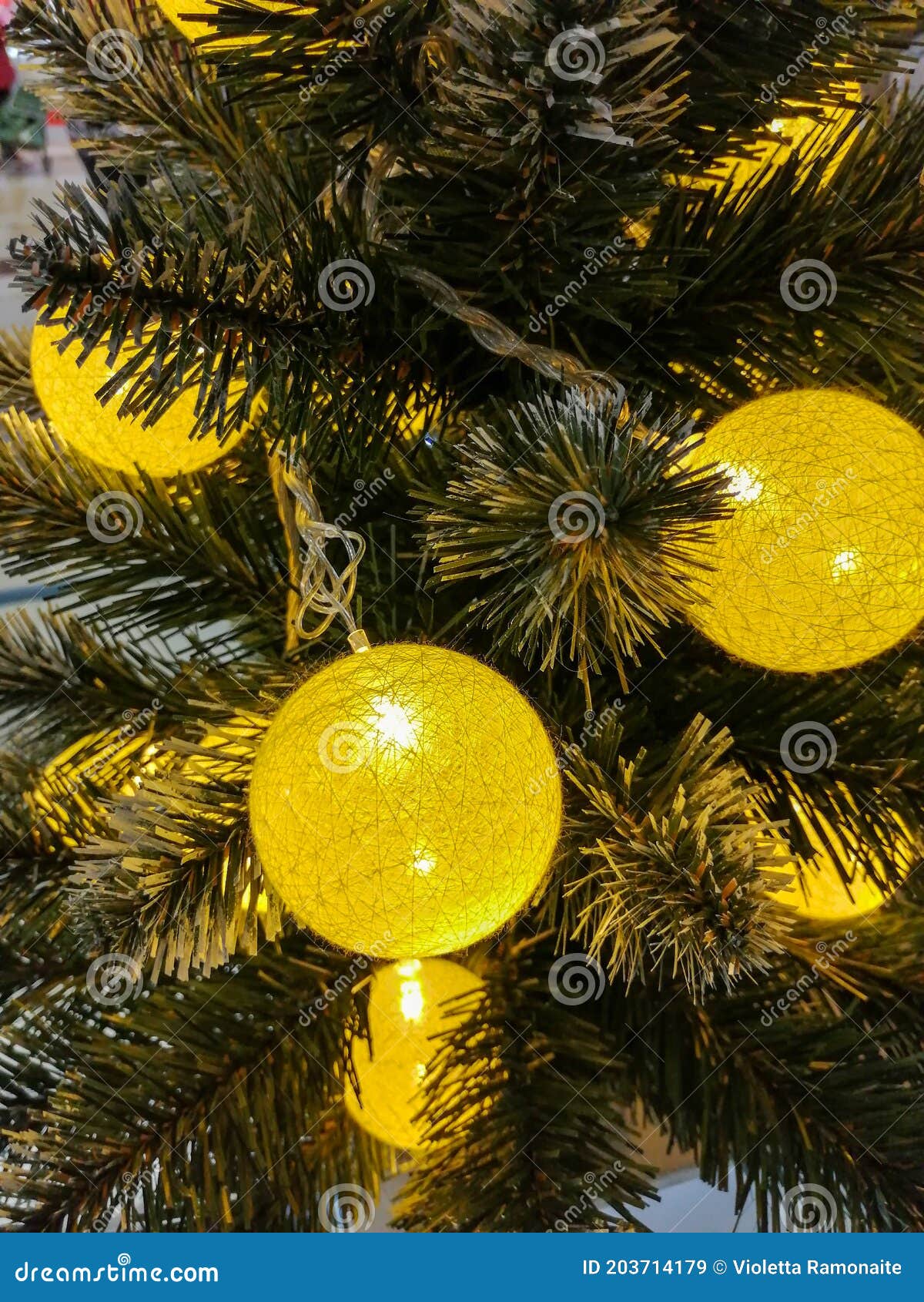 Christmas Tree with Large Yellow Balls Fragment Stock Image - Image of ...