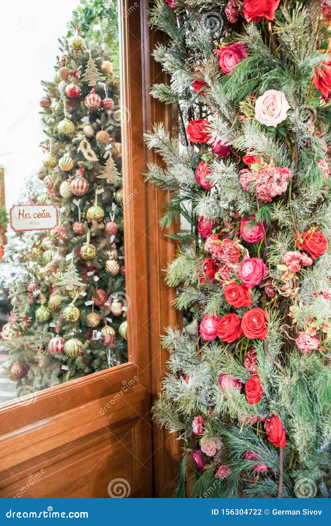 Christmas Tree Near the Entrance Stock Photo - Image of decorated, xmas ...