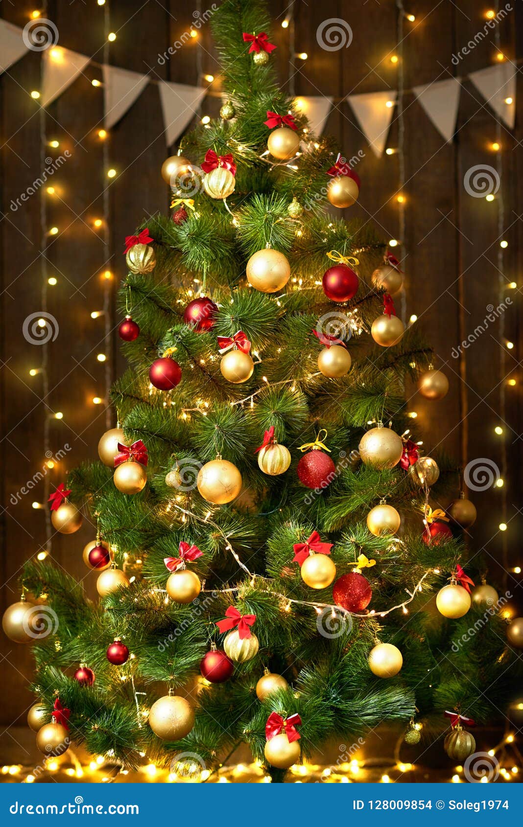 Christmas Tree with New Year Decoration and Lights on Wooden Background ...