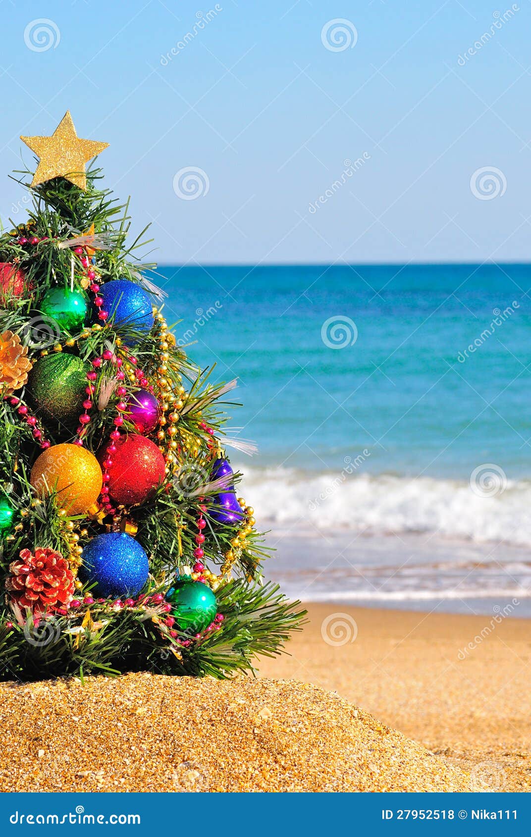 Christmas Tree on Sand in the Beach Stock Photo - Image of colored ...