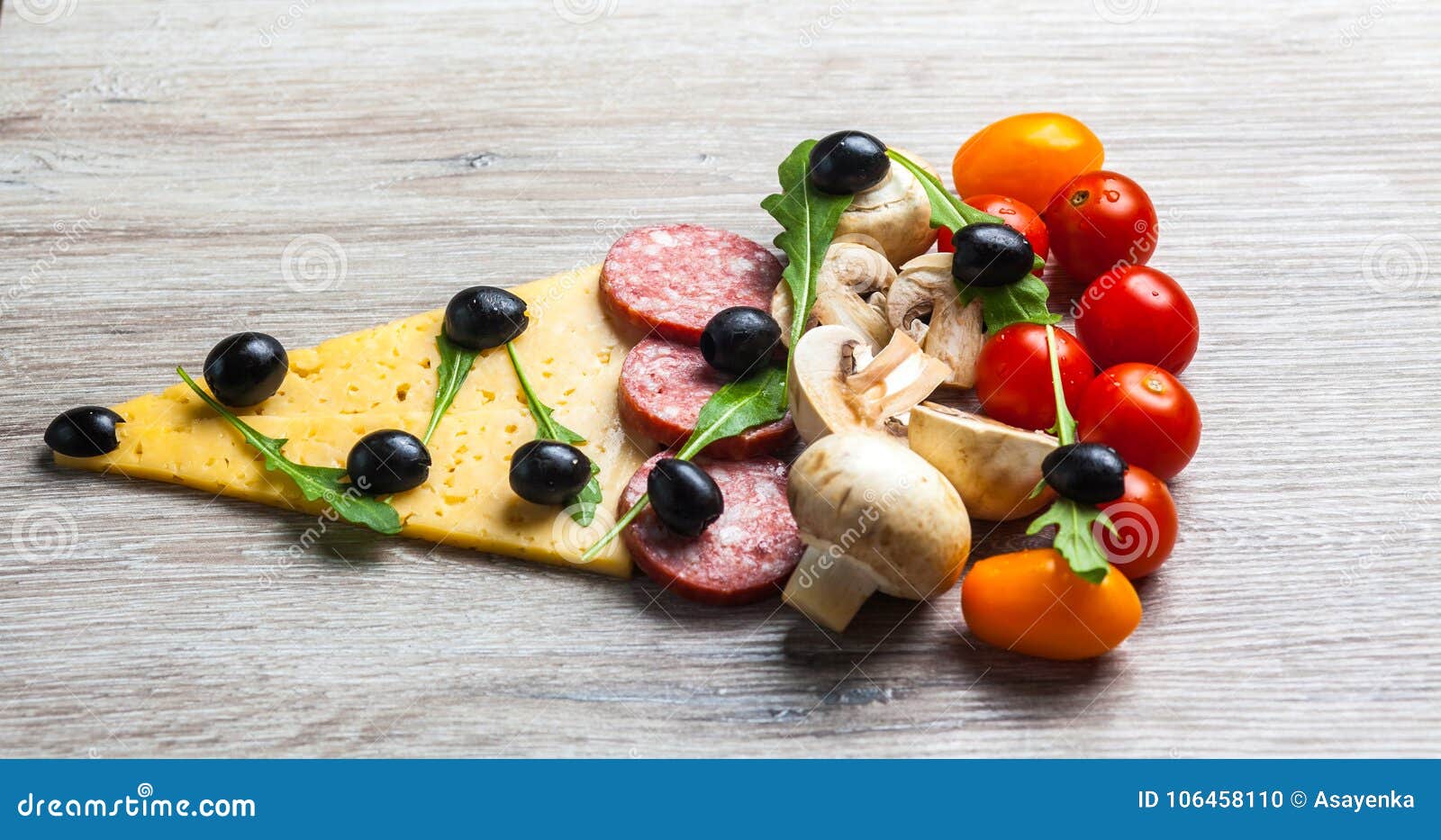 Christmas Tree Shaped Pizza with Cherry Tomatoes and Olives Stock Photo ...