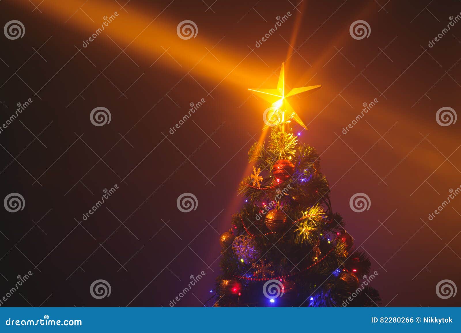 Christmas Tree with Shining Star and Dense Mist Stock Photo - Image of ...