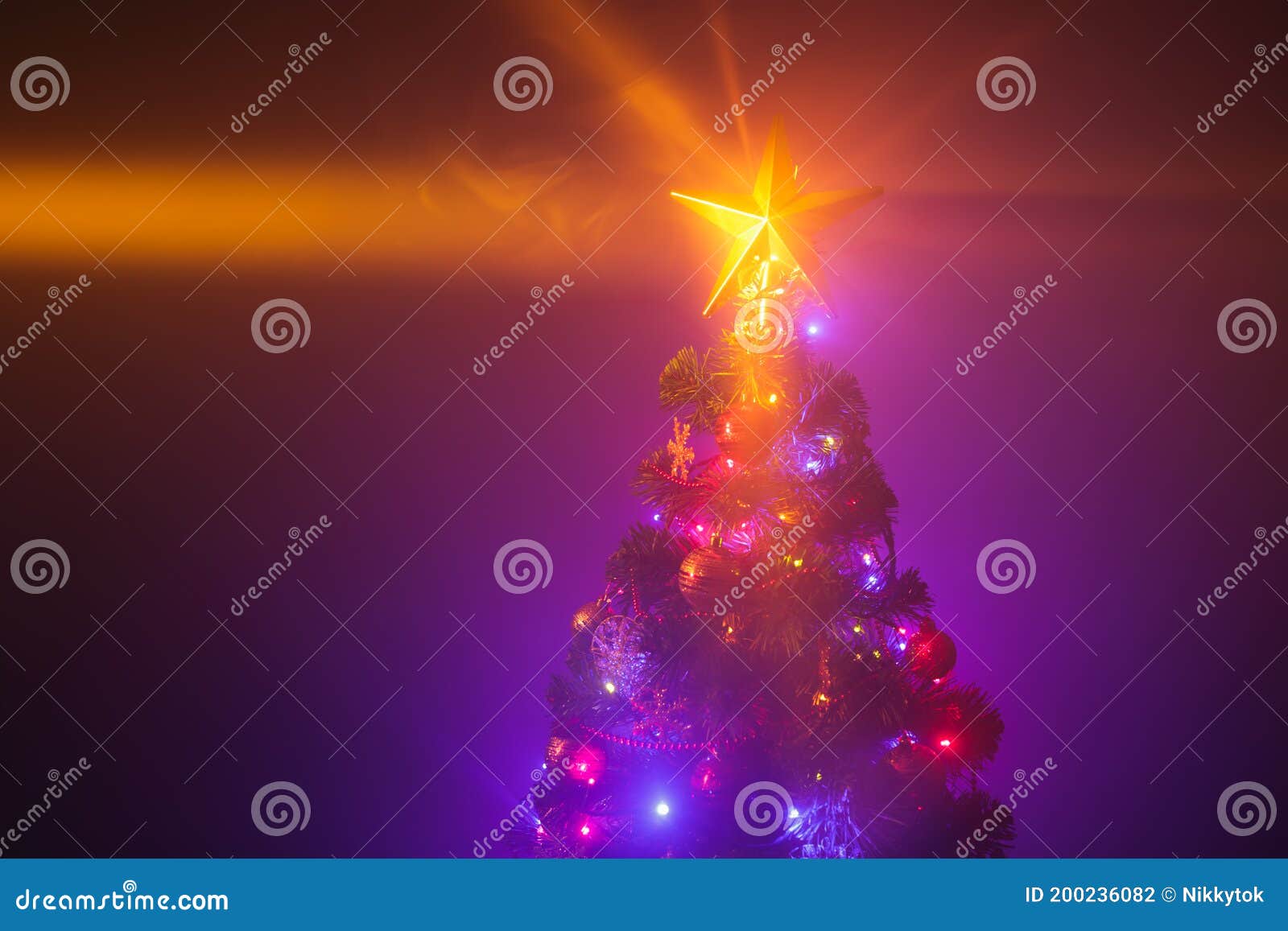 Christmas Tree with Shining Star and Dense Smoke Stock Photo - Image of ...