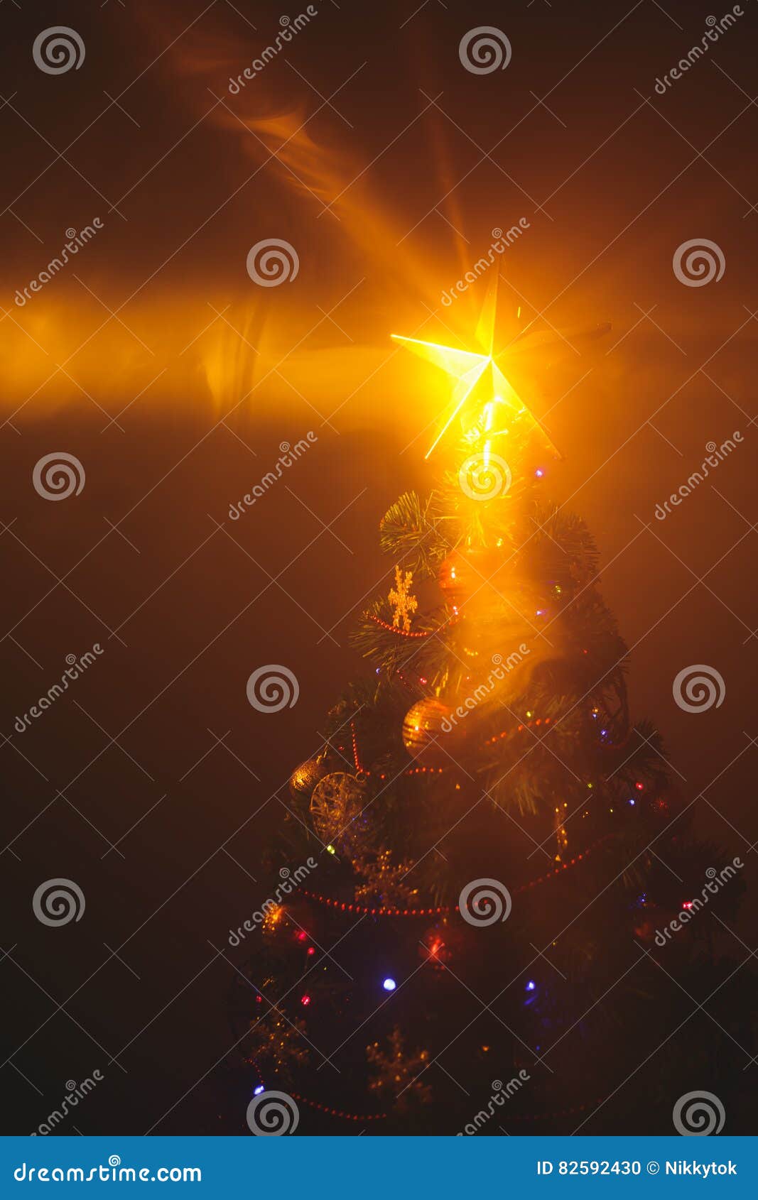 Christmas Tree with Shining Star and Smoke Stock Photo - Image of ...