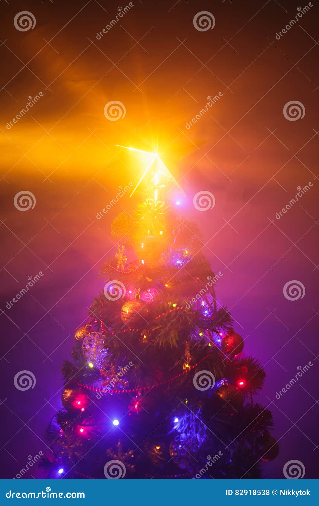 Christmas Tree with Shining Star and Smoke Stock Photo - Image of pine ...