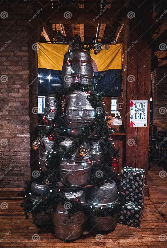 Christmas Tree with a Stack of Metal Barrels Editorial Photography ...