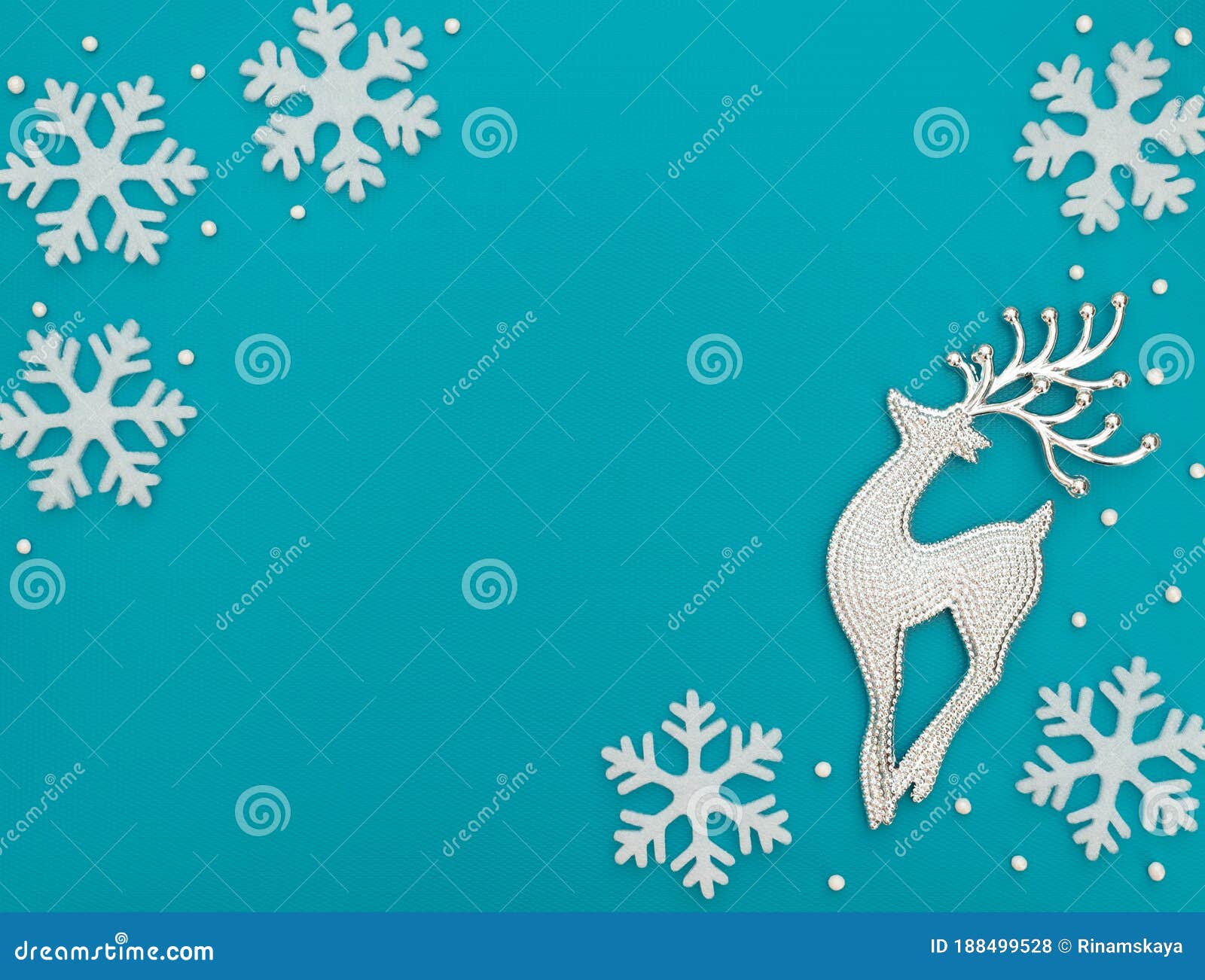 Christmas or Winter Blue Background with One Deer and White Snowflakes ... Christmas or Winter Blue Background with One Deer and White Snowflakes ...