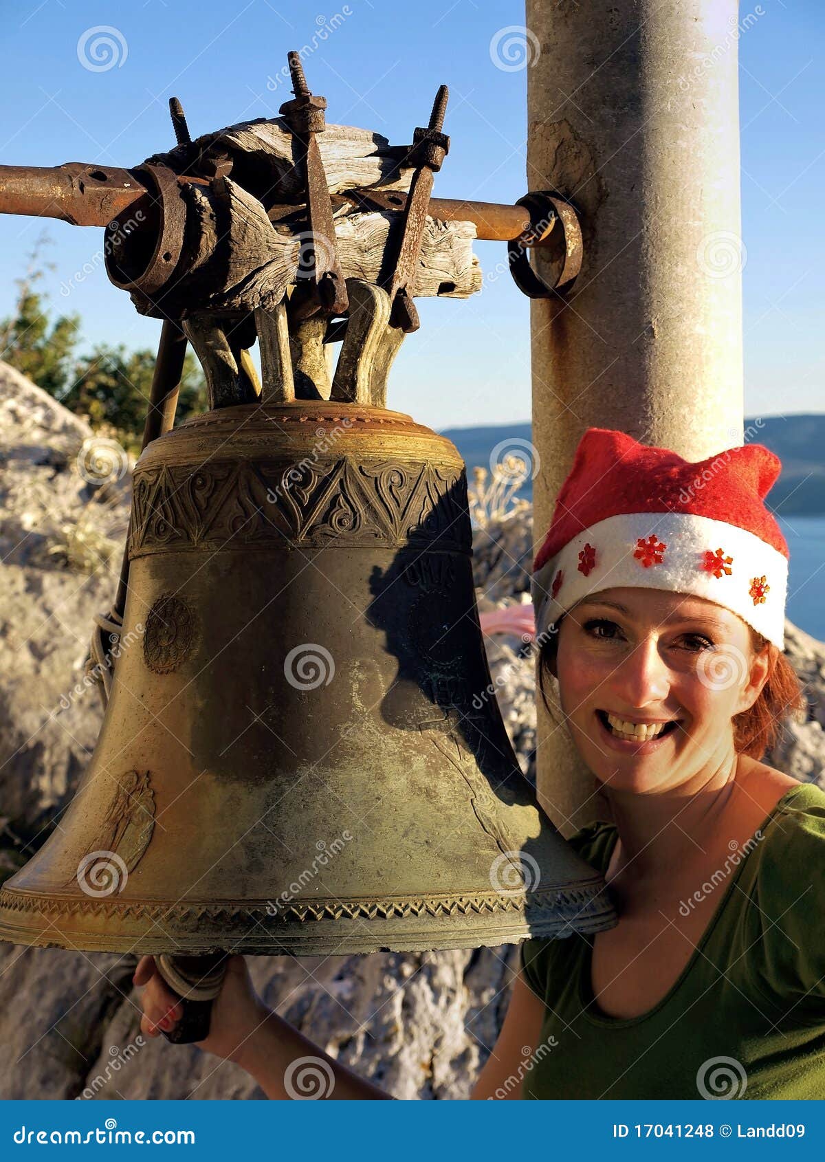 Christmas Woman Holding a Bell Stock Photo - Image of hand, celebration ...