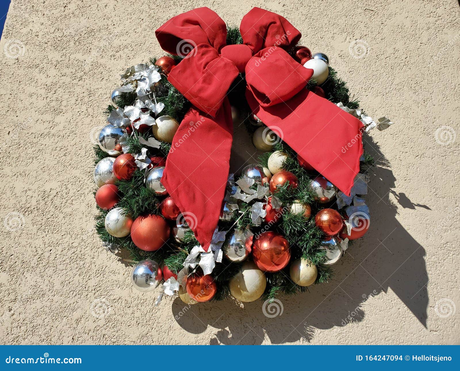 Christmas Wreath on Stone Wall Stock Photo - Image of wall, holiday ...