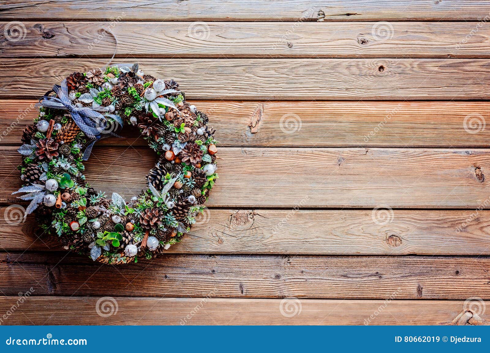 Christmas Wreath on Wooden Rustic Background. Stock Image - Image of ...
